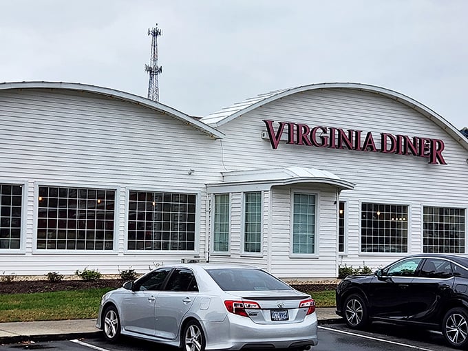 The iconic white exterior of Virginia Diner stands proudly against the sky, a beacon of comfort food that's been welcoming hungry travelers since 1929.
