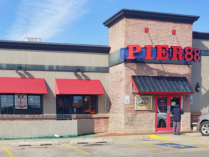 The bright red Pier 88 sign stands out like a lighthouse for seafood lovers, beckoning hungry Oklahomans to this coastal oasis in the heartland.