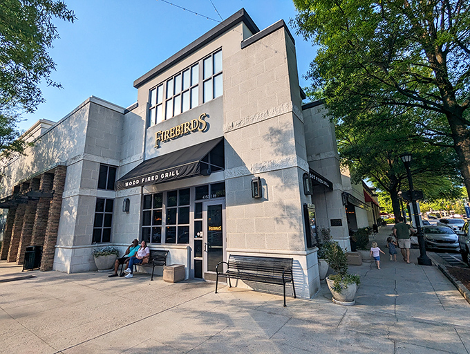 The blue glow of Firebirds beckons like a lighthouse for the hungry. At night, its warm exterior promises culinary adventures await inside.