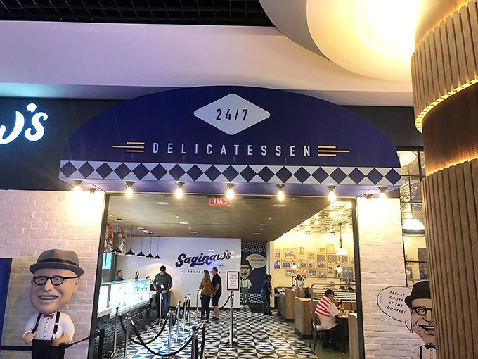 The entrance to sandwich nirvana features the classic blue and white floor pattern&mdash;a universal language that screams "serious deli business ahead."