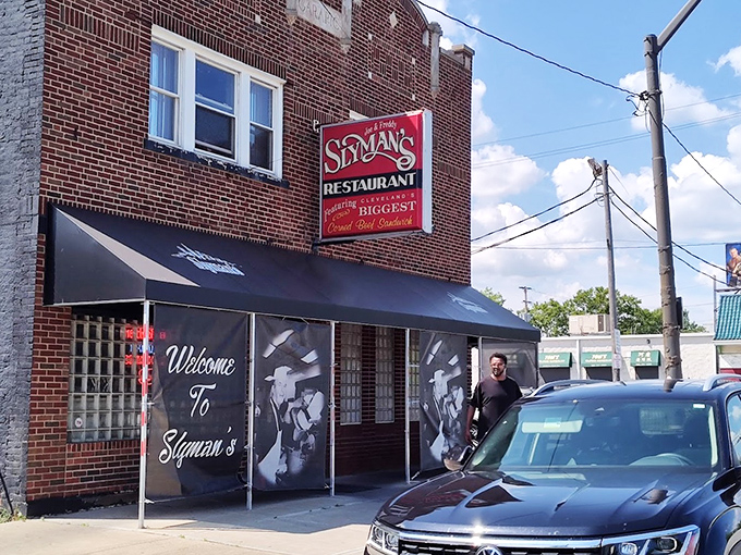 The brick facade of Slyman's proudly announces its mission with that iconic red sign: "Home of the Biggest Corned Beef Sandwiches." Consider yourself warned&mdash;and enticed.
