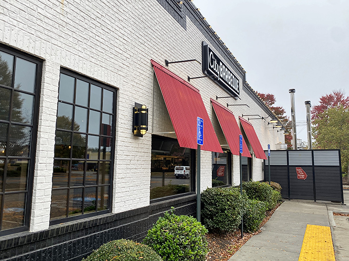 The rustic wooden beams and bright red doors of City Barbeque aren't just inviting&mdash;they're practically a smoke signal to your stomach saying "come hither."