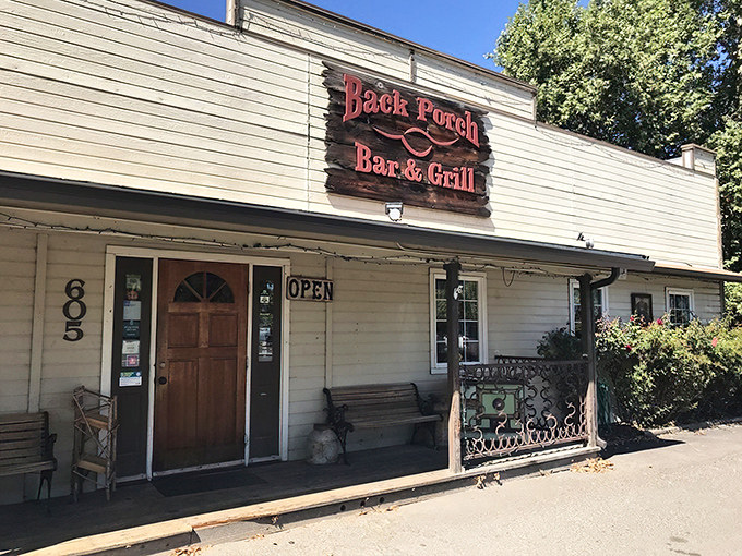 The iconic red fa&ccedil;ade of Back Porch Bar & Grill stands proudly against Jacksonville's blue skies, like a culinary lighthouse beckoning hungry travelers home.