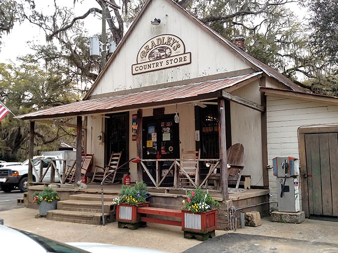The white clapboard facade of Bradley's Country Store stands like a time capsule among the Spanish moss, beckoning hungry travelers with promises of smoky delights.