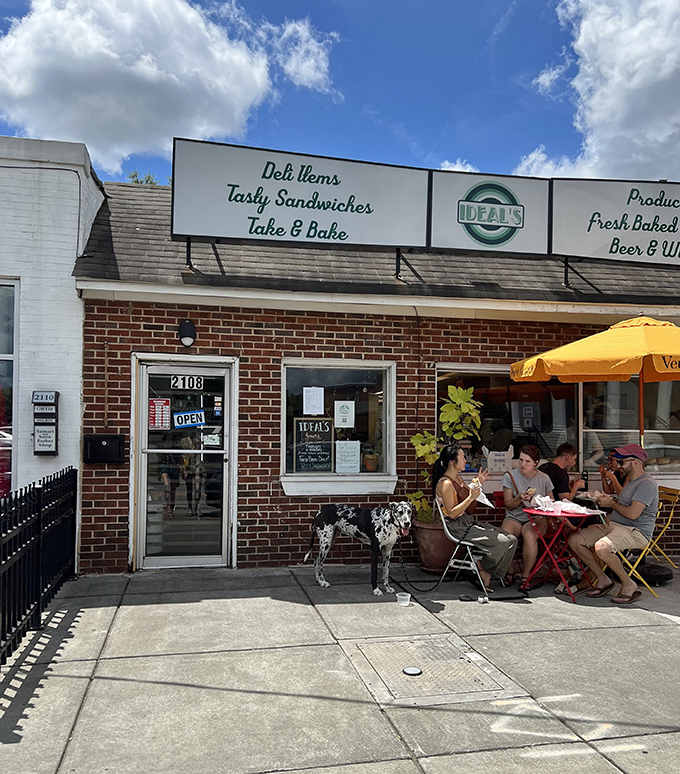 The unassuming storefront of Ideal's hides sandwich greatness within. That simple sign promises more than groceries&mdash;it's a beacon for bread-based bliss. 
