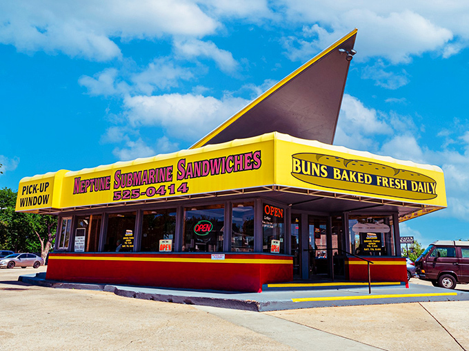 That iconic yellow fin-shaped roof isn't just architectural whimsy—it's a lighthouse for the sandwich-starved souls of Oklahoma City.
