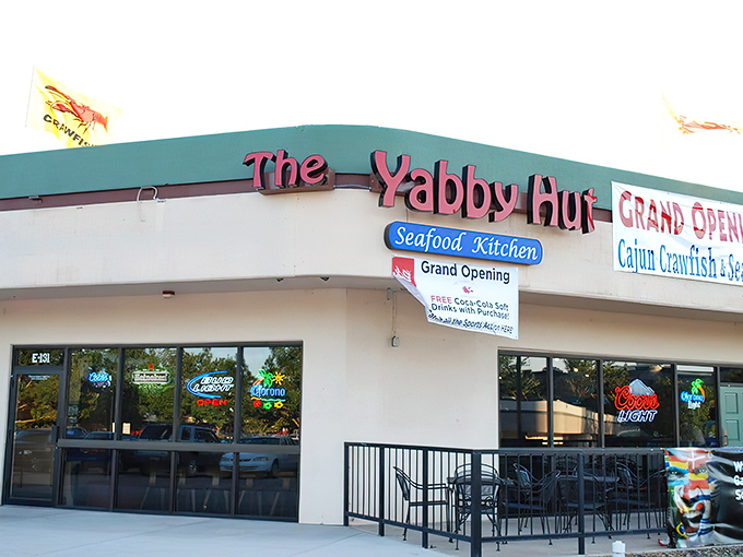 The unassuming exterior of The Yabby Hut belies the seafood treasures within. Like finding pearls in an oyster, the real magic happens once you step inside.