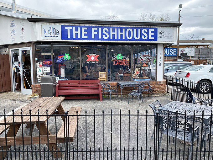 The unassuming exterior of The Fish House belies the seafood treasures within. Blue signage and simple storefront&mdash;culinary magic happens here.