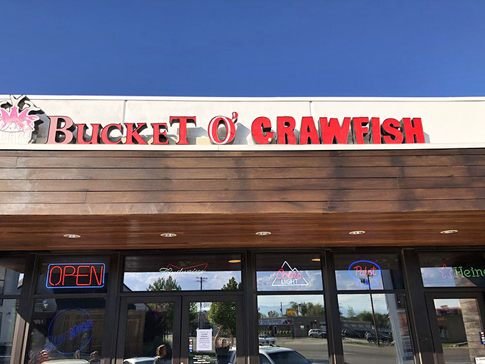 The unassuming exterior of Bucket O' Crawfish belies the seafood paradise within. Like finding Atlantis in a strip mall, but with better parking.