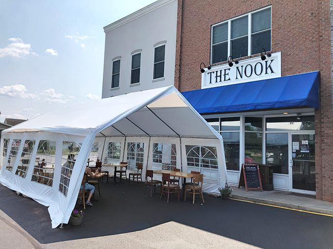 The brick fa&ccedil;ade and bright blue awning of The Nook stands as Milton's humble breakfast fortress, where culinary magic happens without fanfare or fuss.