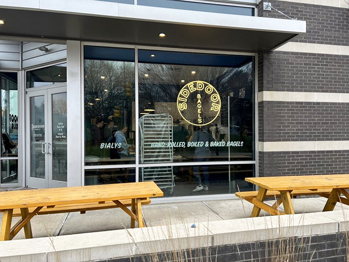 The unassuming exterior of Sidedoor Bagel belies the culinary treasures within. Those flour bags in the window? That's a promise, not decoration.