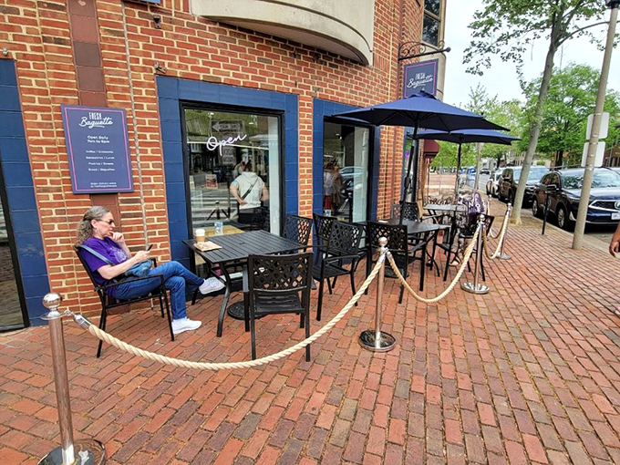 Fresh Baguette's charming brick exterior with blue trim feels like stumbling upon a secret Parisian caf&eacute; tucked away in Alexandria's historic streets.