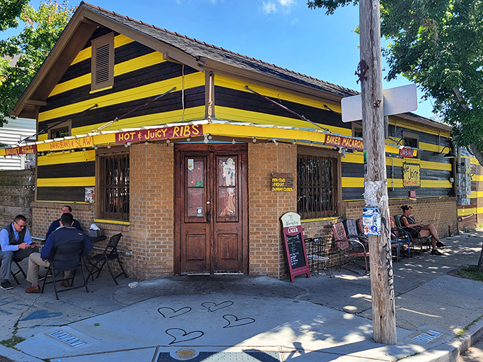 The unmistakable yellow and black striped exterior of The Joint beckons like a barbecue lighthouse in New Orleans' Bywater neighborhood.