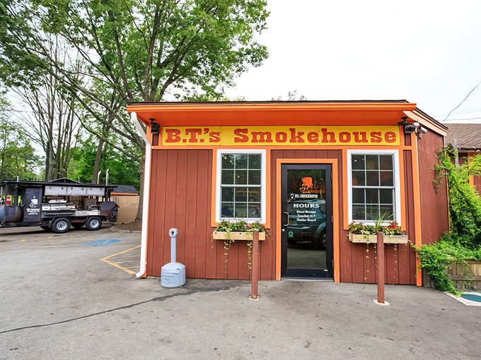 The unassuming red exterior of B.T.'s Smokehouse belies the flavor explosion waiting inside. Like finding a Ferrari engine in a farm truck.