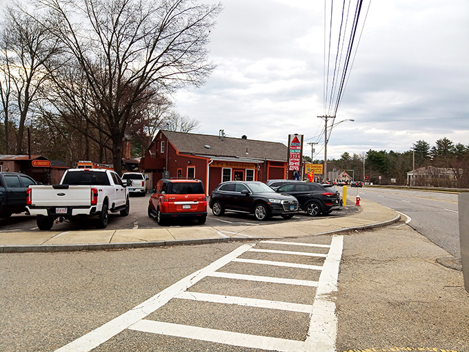 The unassuming red exterior of B.T.'s Smokehouse belies the flavor explosion waiting inside. Like finding a Ferrari engine in a farm truck.