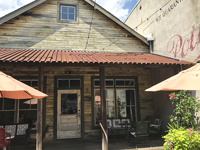 The rustic wooden facade of Fette Sau beckons like a barbecue mirage in Fishtown. Those orange umbrellas aren't just for show&mdash;they're meat appreciation stations.