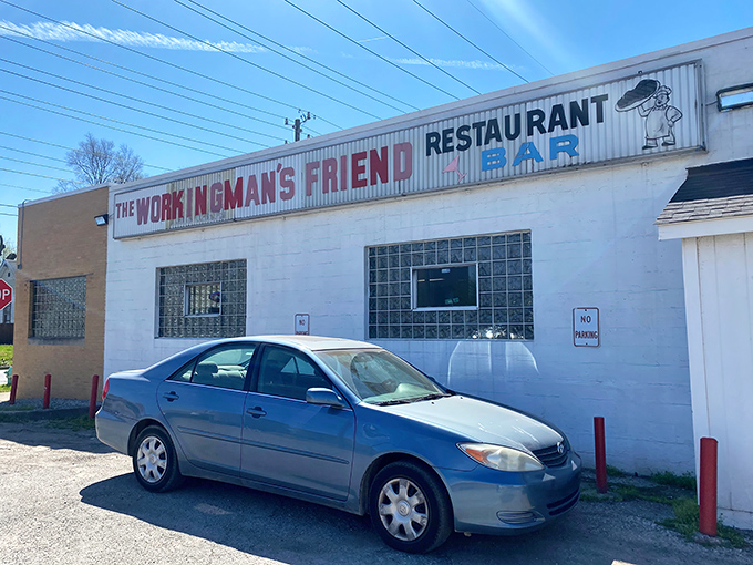 The unassuming exterior of Working Man's Friend stands like a time capsule on Indianapolis's west side, promising honest food without fanfare.