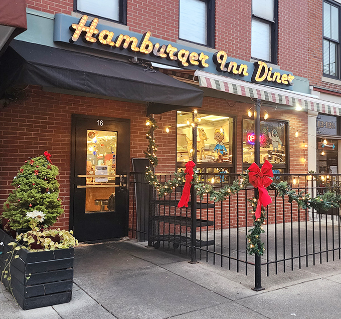 The brick fa&ccedil;ade and vintage signage of Hamburger Inn Diner stands as a time capsule on Delaware's main drag, promising comfort and nostalgia with every visit.