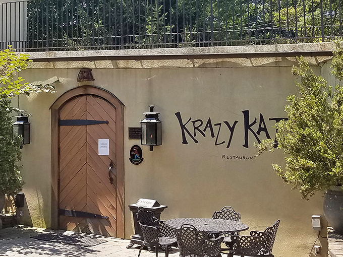 The entrance to culinary wonderland! This whimsical wooden door and playful signage promises an adventure before you've even stepped inside.