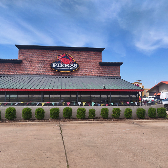 The bright red Pier 88 sign stands out like a lighthouse for seafood lovers, beckoning hungry Oklahomans to this coastal oasis in the heartland.