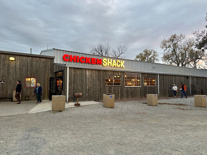 The unassuming exterior of Chicken Shack stands like a culinary lighthouse on Route 66, beckoning hungry travelers with its bold red-and-yellow sign.