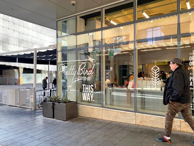 The sleek storefront of Pretty Bird beckons with its elegant cursive logo and minimalist design. Salt Lake City's hottest chicken joint doesn't need flashy gimmicks to draw you in.