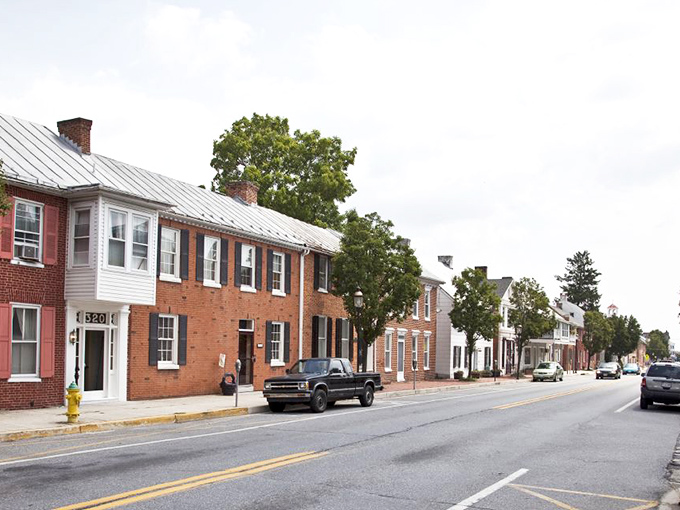 Main Street's historic brick buildings stand like patient sentinels, witnessing centuries of American life while maintaining their dignified charm.