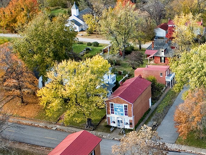 Arrow Rock unfolds like a living watercolor painting, its autumn-tinged trees and historic rooftops creating a scene worthy of a PBS special.