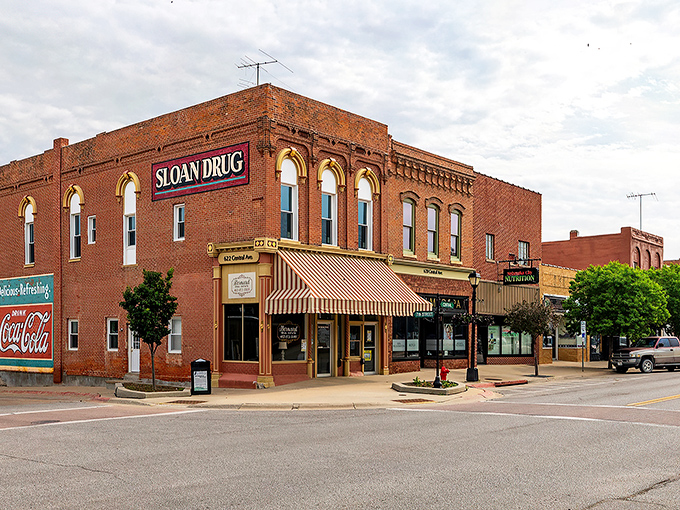Downtown Nebraska City feels like stepping into a Norman Rockwell painting where brick buildings tell stories and Sloan Drug might still serve phosphates at the counter.
