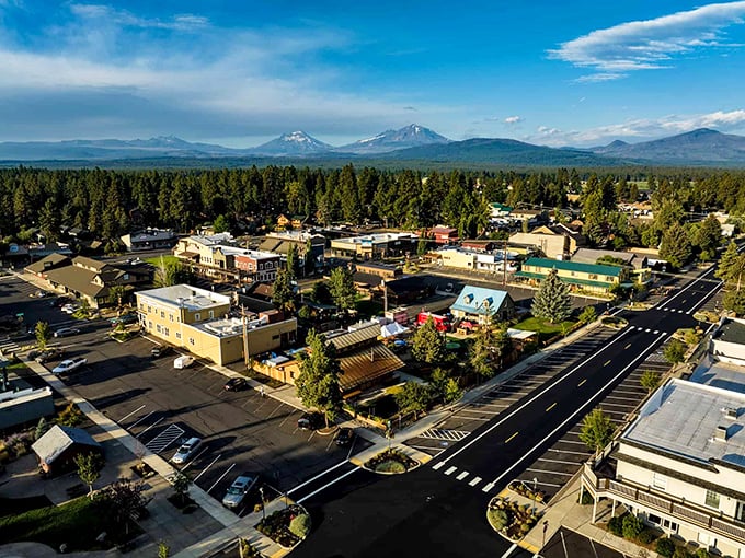 Sisters' Western-themed storefronts stand like a movie set against the breathtaking backdrop of snow-capped Cascade peaks, proving small towns can deliver big views.