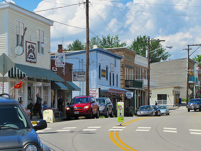 Main Street, Floyd – where the American flag waves proudly and one stoplight means you've arrived at Virginia's most charming small town secret.