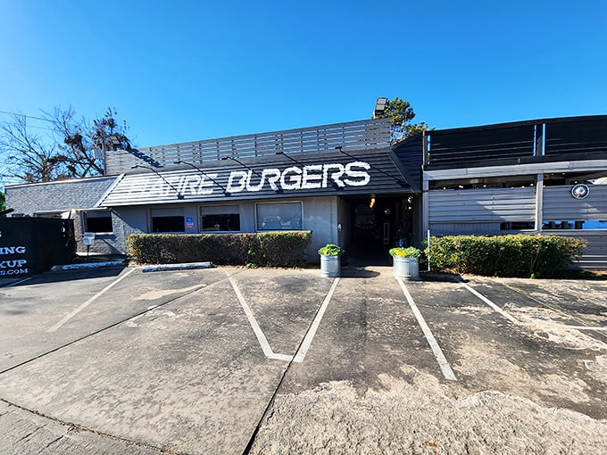 The unassuming exterior of Flatire Burgers belies the culinary magic happening inside. Like finding a diamond in a parking lot.