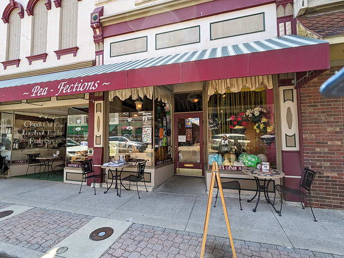 The charming storefront of Pea-Fections beckons from historic downtown Vincennes, promising sweet treasures behind that striped awning and vintage fa&ccedil;ade.