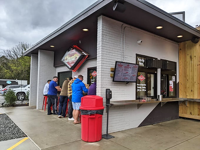 The unassuming white brick exterior of Cheat's Cheesesteaks proves once again that culinary treasures often hide in the simplest packages. 