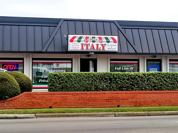 The unassuming storefront that launched a thousand food pilgrimages. Italian colors proudly announce what awaits inside: culinary authenticity without pretense. 