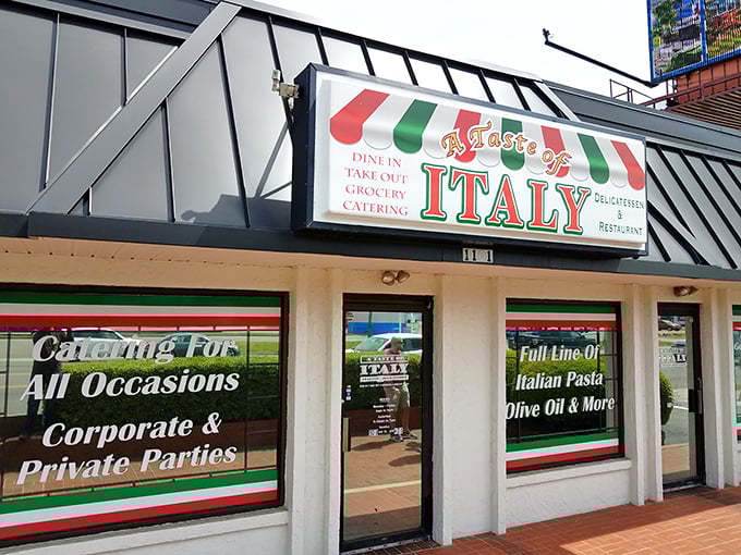 The unassuming storefront that launched a thousand food pilgrimages. Italian colors proudly announce what awaits inside: culinary authenticity without pretense.