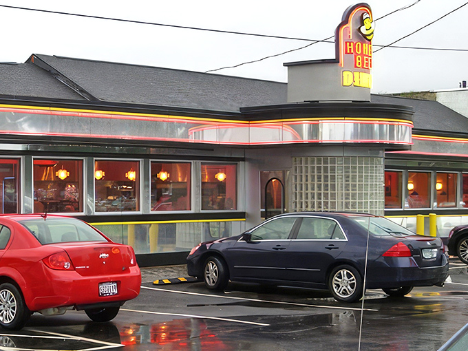 The classic mid-century silhouette of Honey Bee Diner stands proudly on Ritchie Highway, its cheerful bee mascot promising sweet comfort inside.