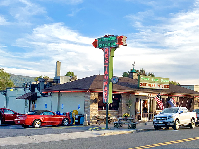That vintage neon sign isn't just advertising &ndash; it's a time machine beckoning you to simpler days when calories didn't count and gravy was a food group.
