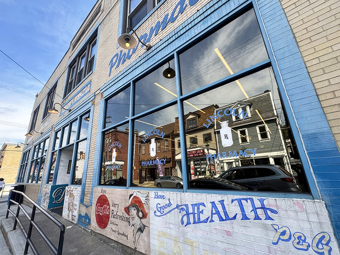 The iconic blue facade of Lincoln's P&G stands as a Pittsburgh landmark, where pharmacy meets diner in a marriage that somehow makes perfect sense.