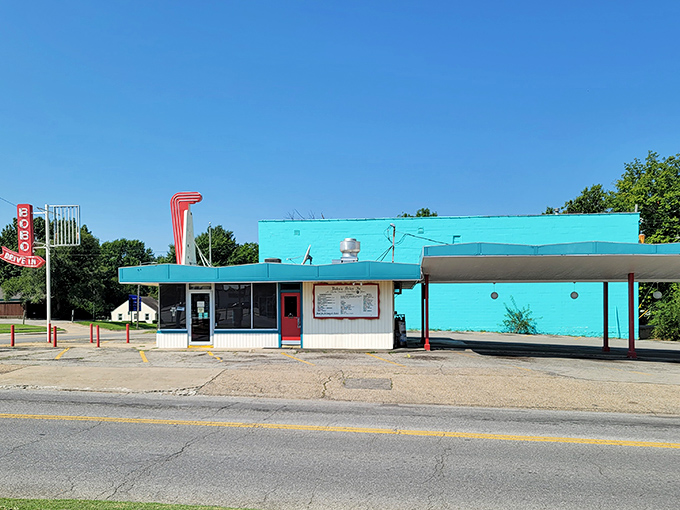 The white exterior of Bobo's stands like a beacon of mid-century nostalgia, promising comfort food that's remained unchanged since Eisenhower was in office.