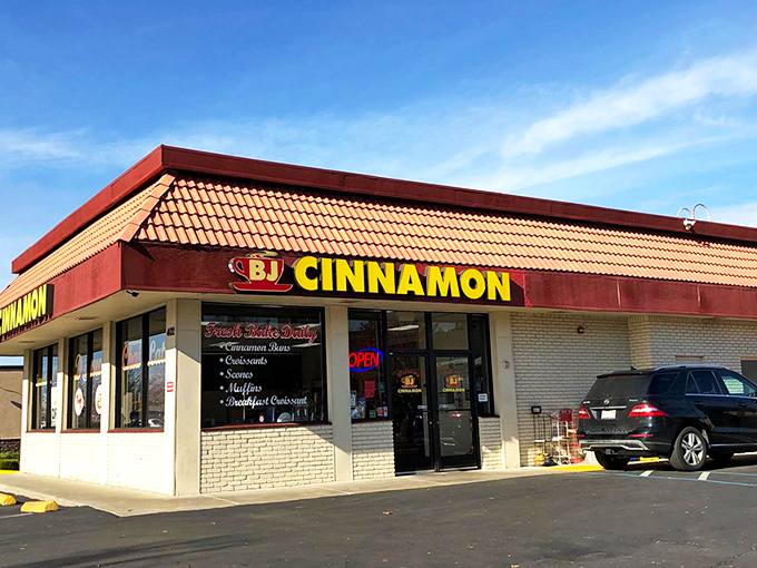 That bright yellow sign isn't just a beacon&mdash;it's a promise of pastry perfection waiting inside this unassuming Folsom strip mall gem.