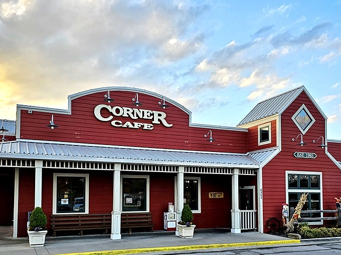 The iconic red barn exterior of Corner Cafe beckons hungry travelers like a lighthouse for growling stomachs on the Missouri prairie.