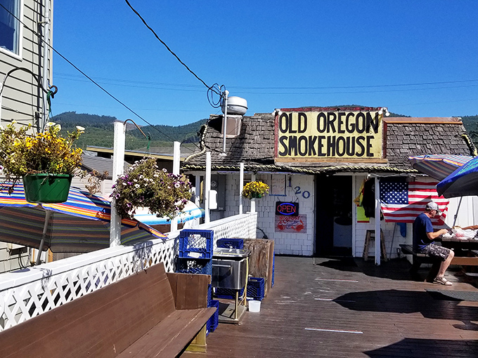 The weathered charm of Old Oregon Smoke House beckons seafood lovers like a siren call. This unassuming coastal treasure has been satisfying hungry beachgoers for years.
