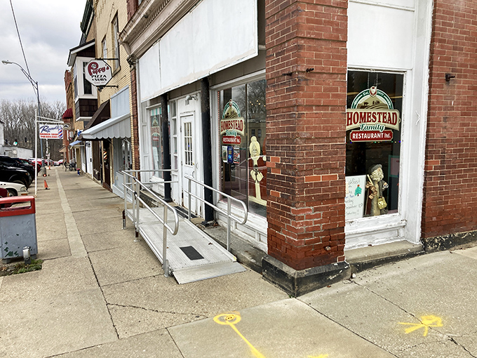 The unassuming brick exterior of Homestead Family Restaurant stands as a beacon of comfort food promise on Fredericktown's Main Street. Small-town charm, big-time flavors await.
