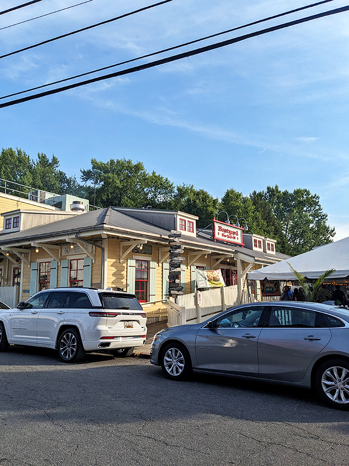 The cheerful yellow exterior of Boatyard Bar & Grill stands like a beacon for seafood lovers, promising maritime delights within its nautical embrace.