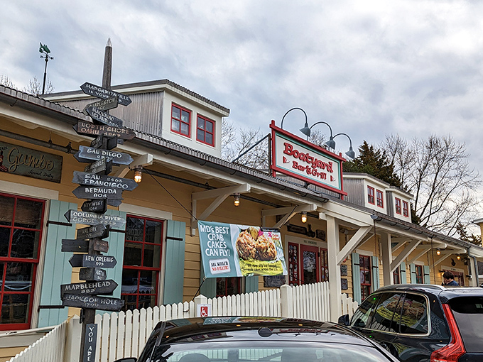 The cheerful yellow exterior of Boatyard Bar & Grill stands like a beacon for seafood lovers, promising maritime delights within its nautical embrace.