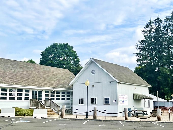 The classic white clapboard exterior of Lenny & Joe's stands like a beacon for seafood lovers&mdash;New England architecture that practically whispers "fresh catch inside."