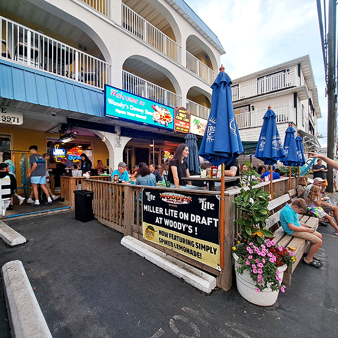 The unassuming blue awning of Woody's might not scream "food destination," but locals know this Dewey Beach treasure houses crab cake royalty.