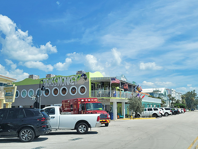 The sunshine-yellow exterior of Brass Monkey stands out like a beacon of culinary hope on St. Pete Beach, promising good times on both levels.