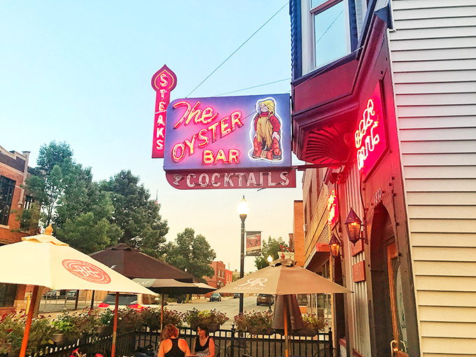 The Oyster Bar's vintage neon sign glows like a maritime lighthouse, guiding hungry Hoosiers to this Fort Wayne seafood sanctuary.